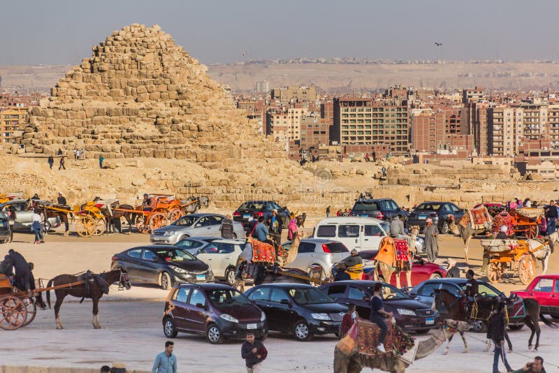 CAIRO, EGYPT - JANUARY 28, 2019: Parking Lot in Front of the Great Pyramid of Giza, Egy ...