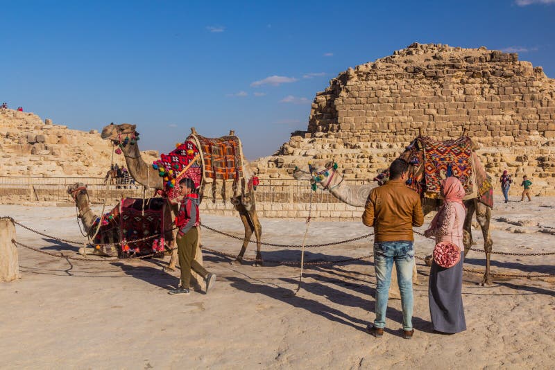 CAIRO, EGYPT - JANUARY 28, 2019: People with Camels in Front of Queens ...