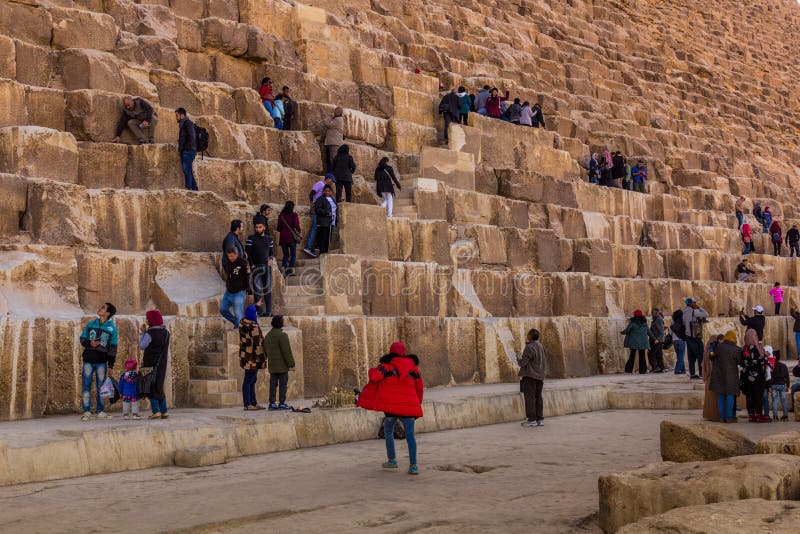 CAIRO, EGYPT - JANUARY 28, 2019: People Climb the Great Pyramid of Giza ...