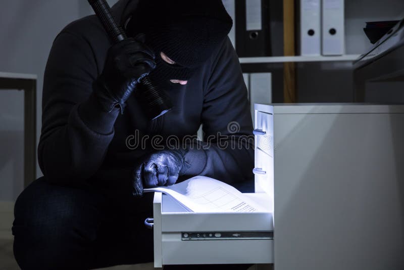 Ladrón Que Roba El Documento En Oficina Imagen de archivo - Imagen de ...