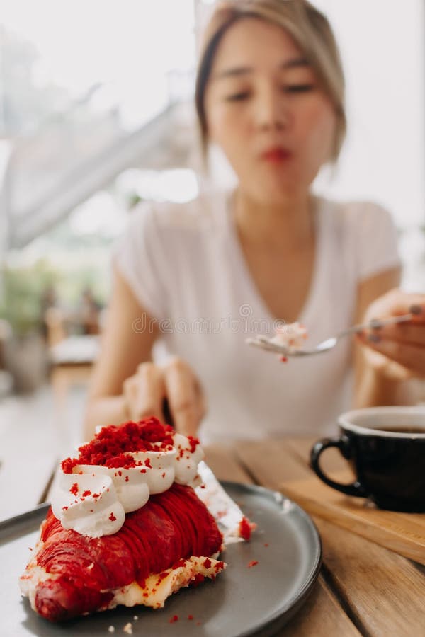 Cake Being Eat by Woman in the Cafe. Focus Selective on the Cake. Stock ...