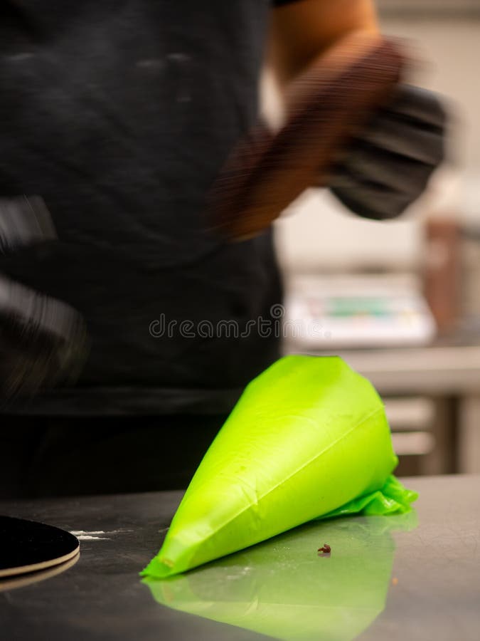 Cake Designer Preparing a Cream Cake Decorating with Melting Wafers in ...