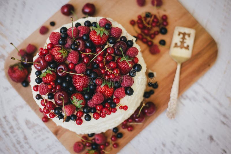 Cake with Fresh Berries and White Glaze Stock Image - Image of piece ...