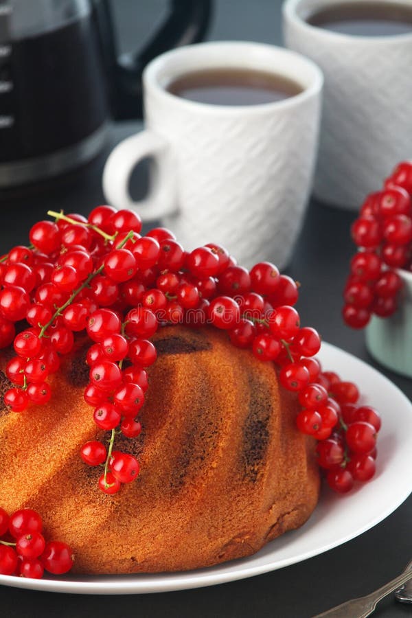 A Cake with Fresh Red Currant and Tea Stock Photo - Image of black ...