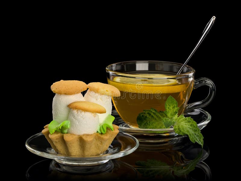 Cake `mushroom` and Green Tea with a Lemon and Mint Stock Photo - Image ...