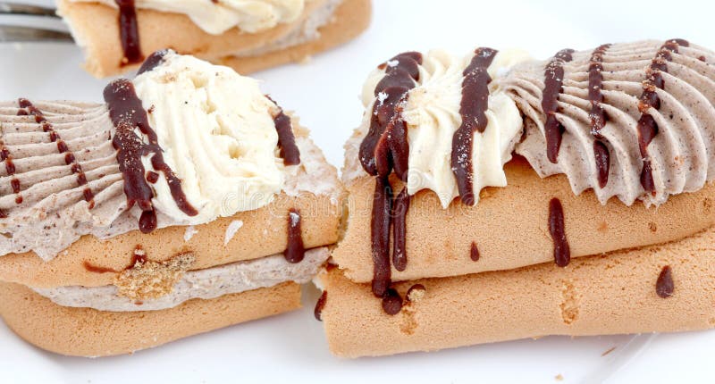 Cake Pieces of Chocolate and Vanilla Filling. Stock Image - Image of ...