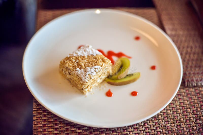 Cake on a plate in cafe stock image. Image of fattening - 75127103