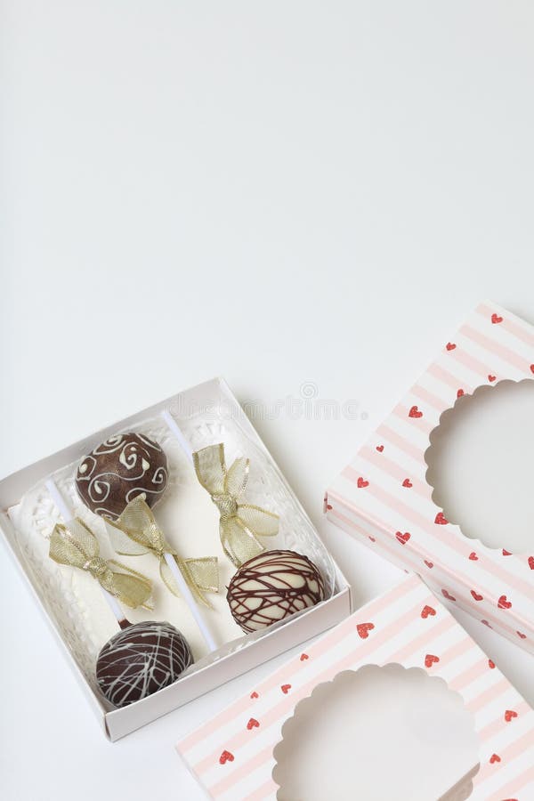 Cake Pops Decorated with a Bow of Braid, Packed in a Gift Box. Next To ...