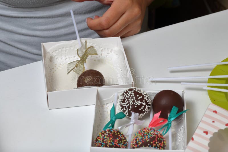 Cake Pops Decorated with a Bow of Braid, Packed in a Gift Box. Next To ...