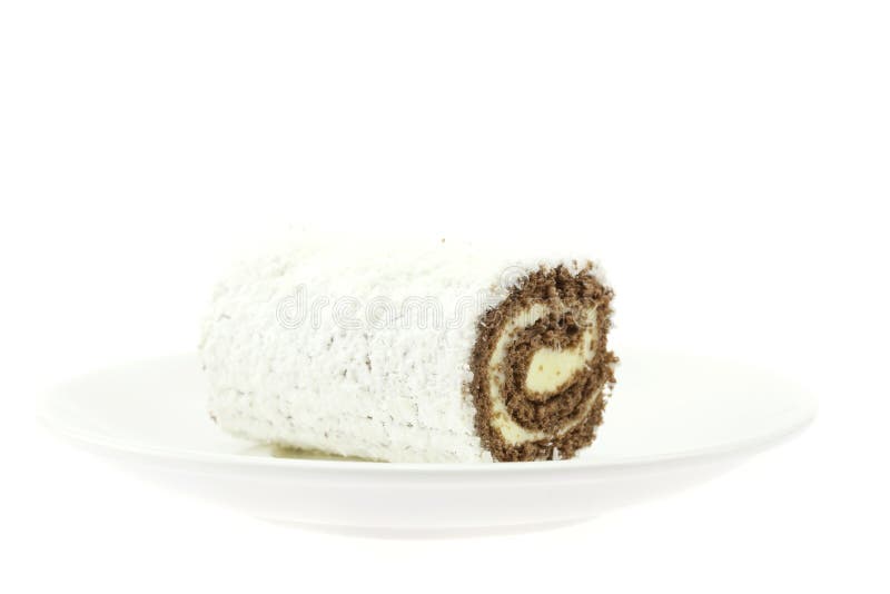 Cake Roll on a Plate Isolated on White Stock Photo - Image of textured ...