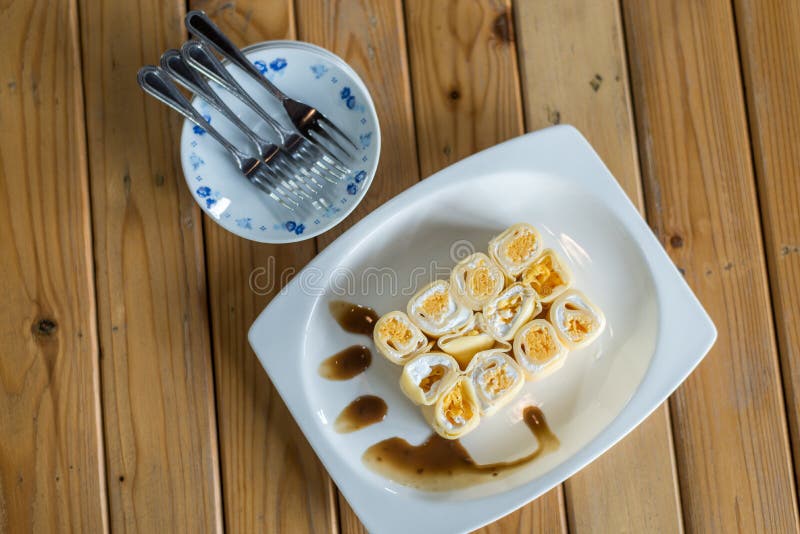 Cake roll on wood table. stock image. Image of breakfast - 128205889