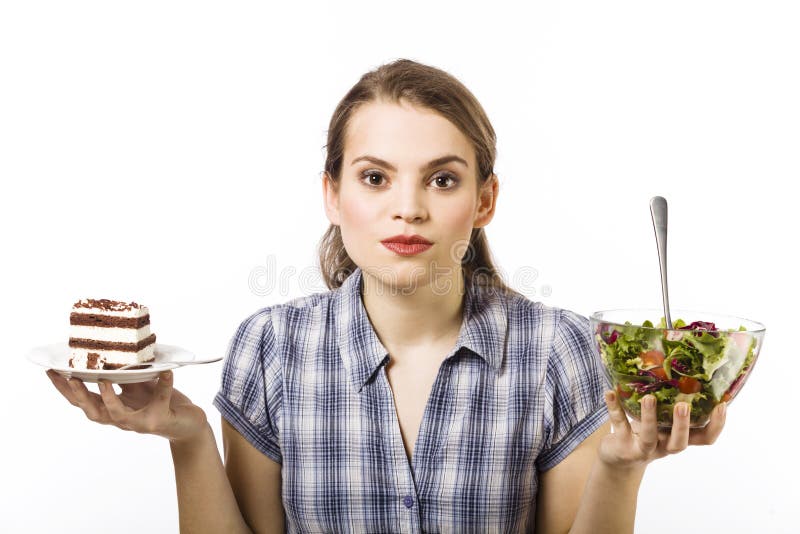 Cake or Salad - that is the Question. Beautiful Young Girl with a ...