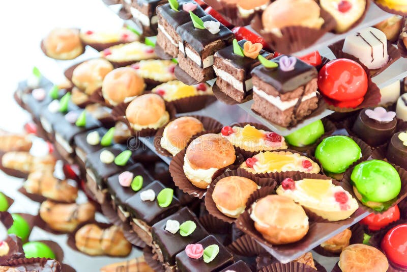 Cake table arrangement stock image. Image of chocolate - 152830655
