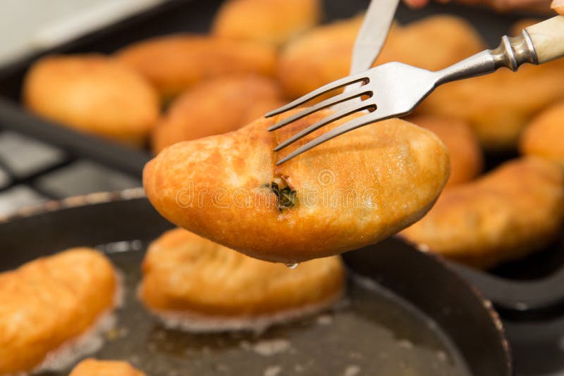 Cakes fried in a pan stock image. Image of dinner, golden - 102576205