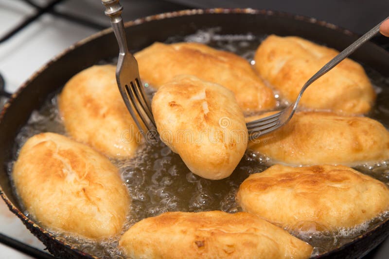 Cakes fried in a pan stock image. Image of fast, balls - 102576245