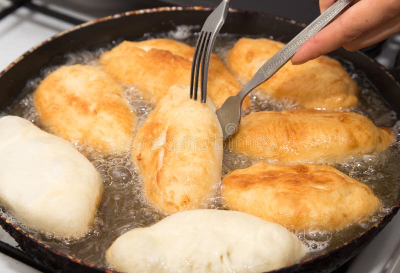 Cakes fried in a pan stock photo. Image of filling, potato - 102576300