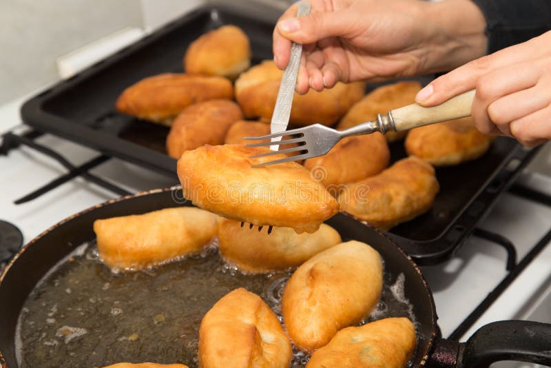 Cakes fried in a pan stock image. Image of filling, delicious - 102576333