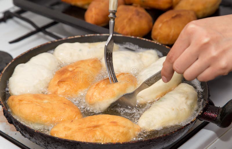Cakes fried in a pan stock image. Image of closeup, dish - 104473017