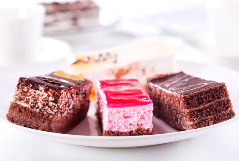 Cakes on a plate stock photo. Image of layer, plate, slice - 55239802