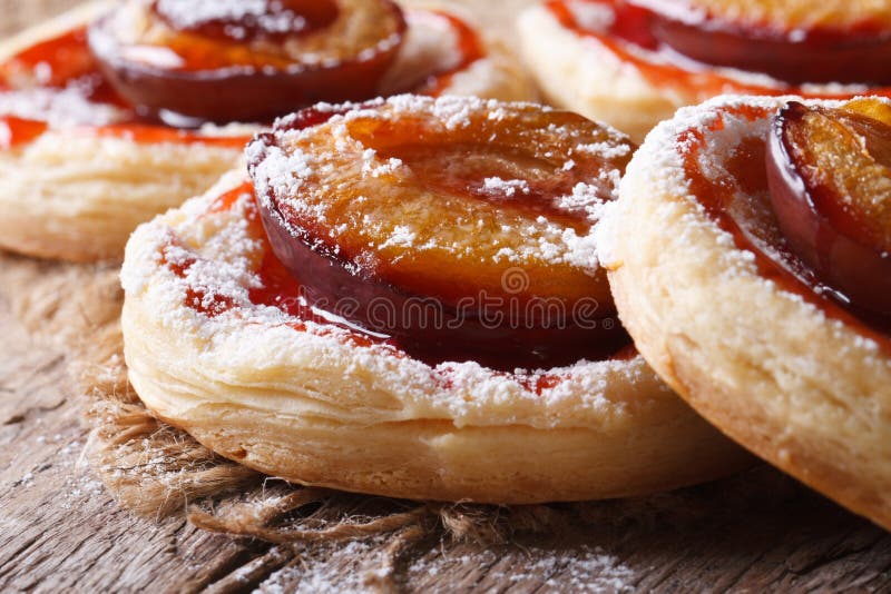 Cakes of Puff Pastry with Plums Macro Horizontal Stock Image - Image of ...