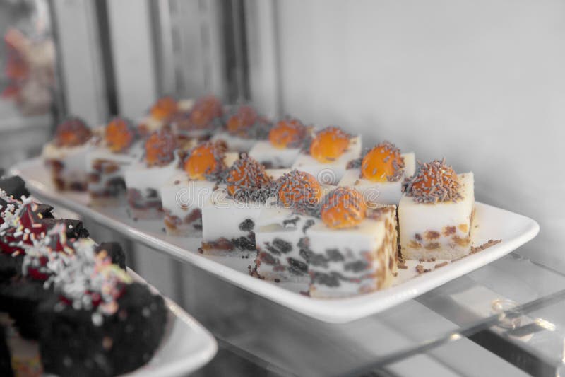 Cakes on a Showcase in a Restaurant Stock Photo - Image of assortment ...