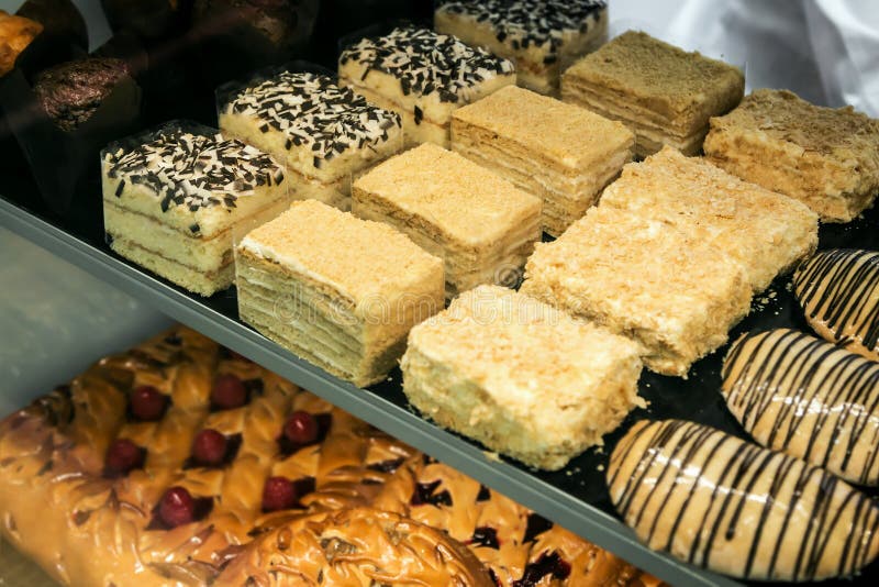 Cakes and Sweets on the Counter of a Candy Store Stock Photo - Image of ...