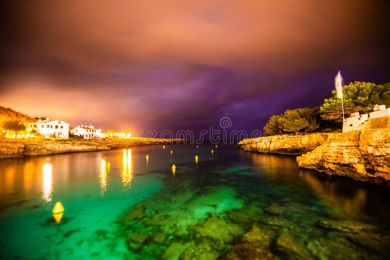 Cala Blanca Beach Resort at Night, Menorca, Spain. Minorca. Stock Photo ...