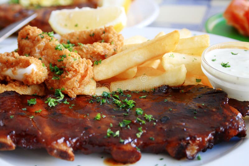 Calamari, ribs and chips stock photo. Image of flavor - 5144860