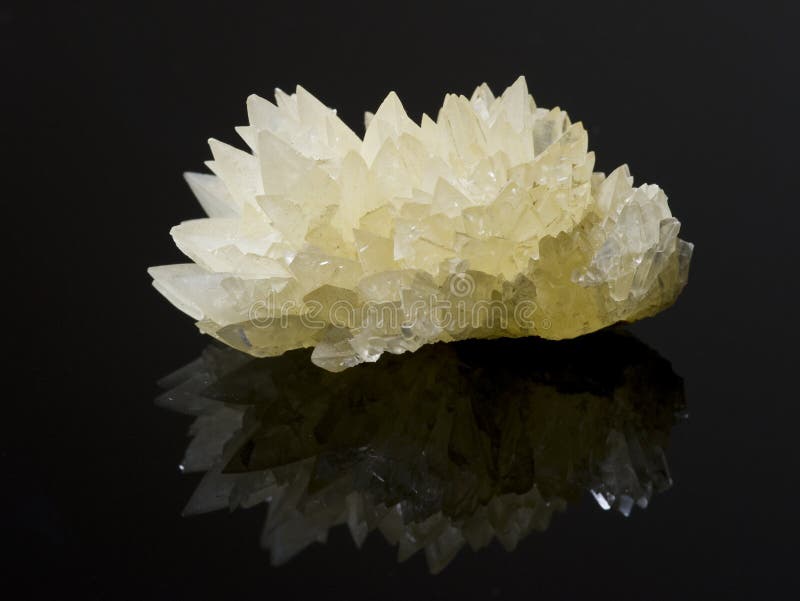Calcite Crystals on a Reflective Surface Stock Image - Image of yellow ...
