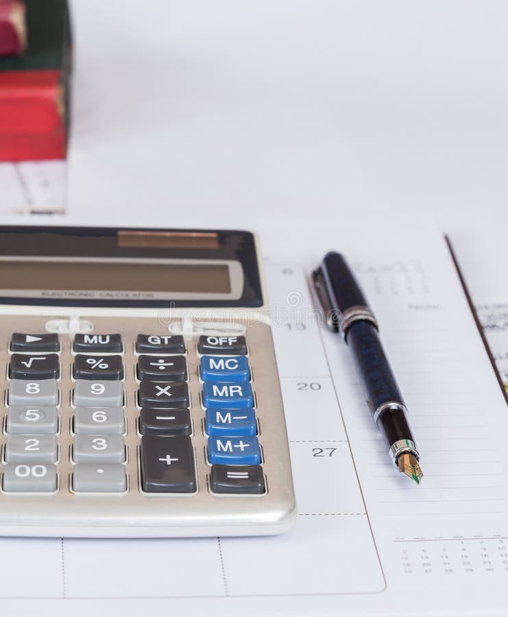 Calculate on calendar stock photo. Image of calculation - 77332276