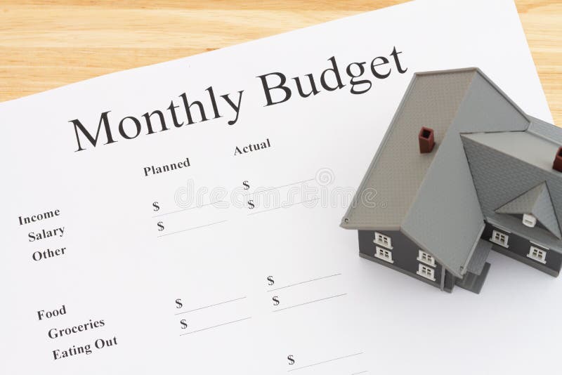 Calculating Your Monthly Budget with a House Stock Image - Image of ...