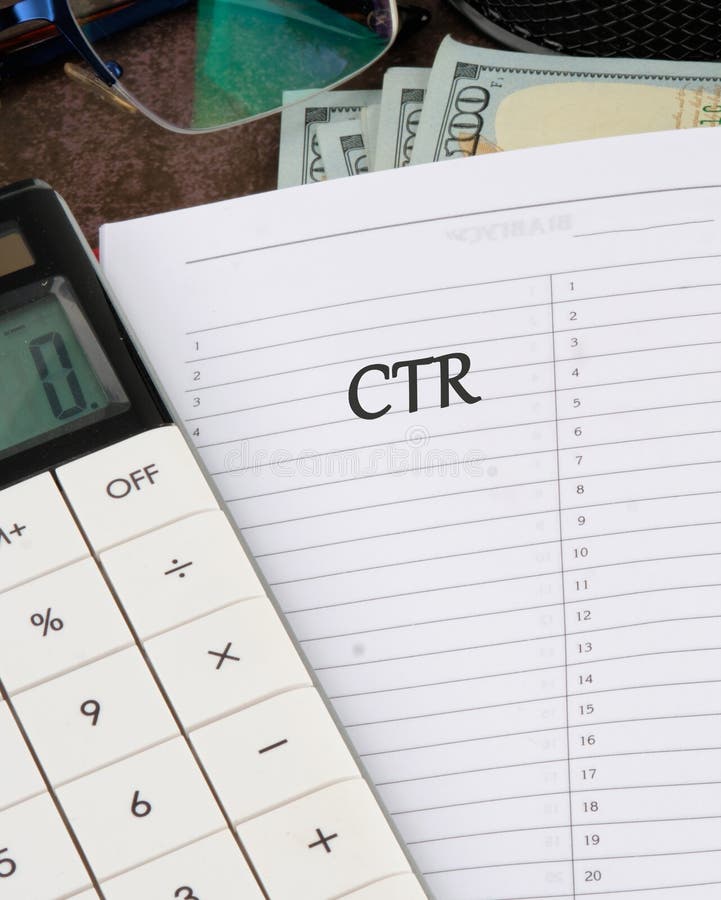 Calculation of CTR with a Digital Calculator and a Notepad on a Desk ...