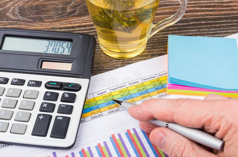 Calculations and Analysis with Tea Stock Photo - Image of hand ...