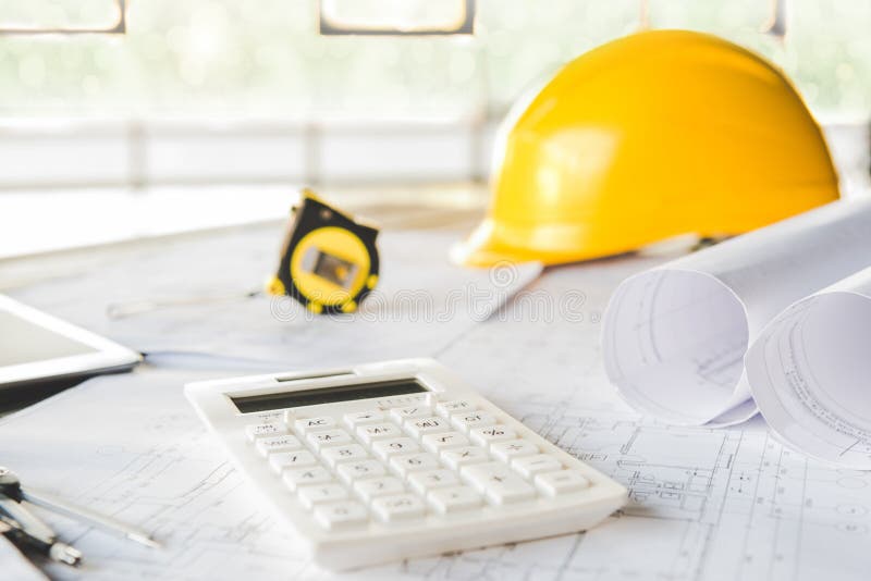 Calculator and Architectural Blueprints Stock Photo - Image of ...