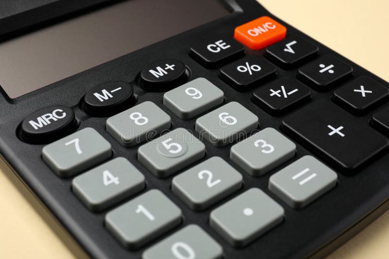 Calculator on Beige Background, Closeup. Office Equipment Stock Photo ...