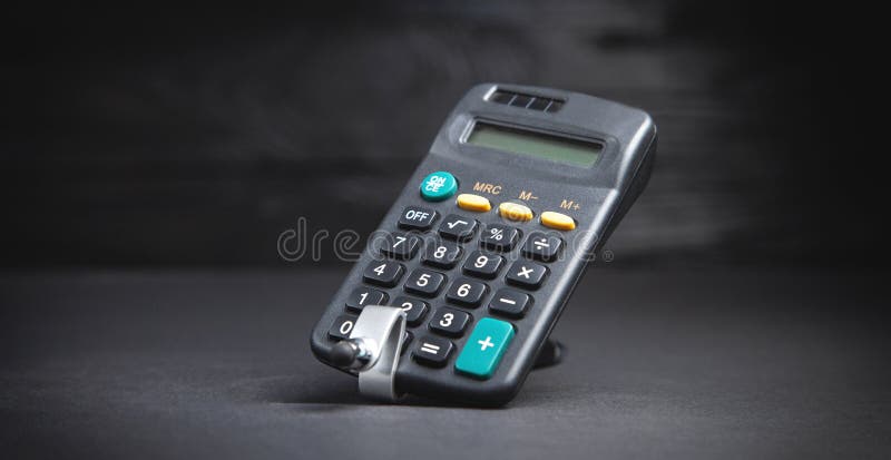 Calculator on the Black Background Stock Photo - Image of finance ...