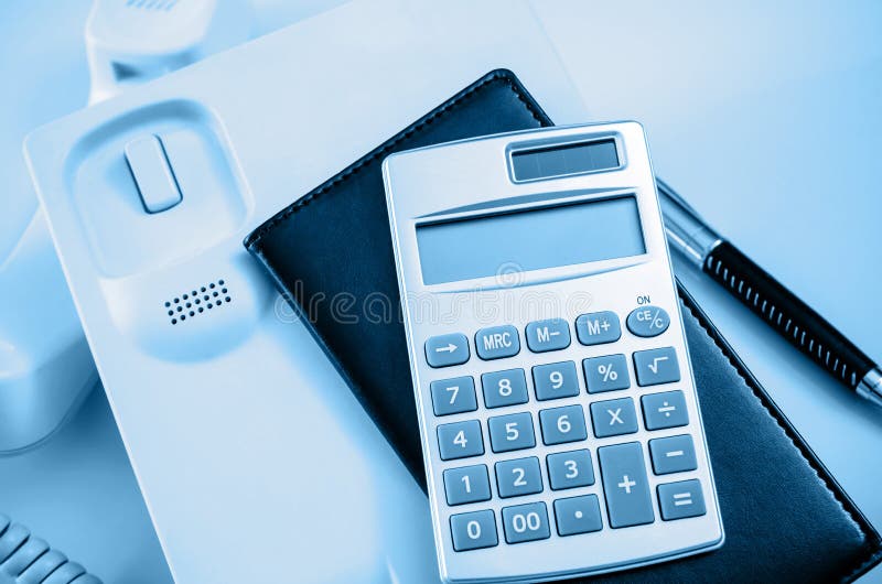Calculator and black book stock image. Image of diary - 36324451