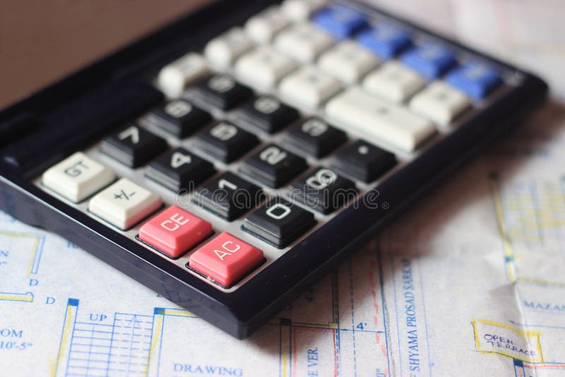 Calculator and Building Plans. Stock Photo - Image of financing ...