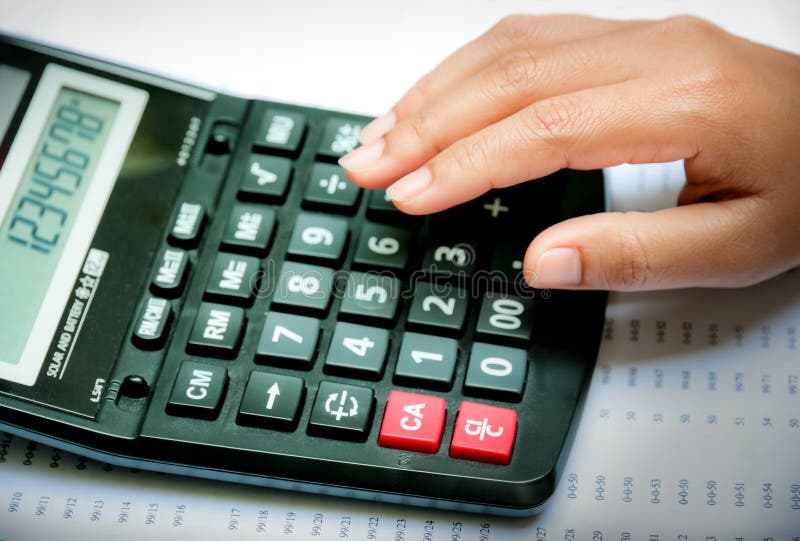 Calculator with business stock photo. Image of number - 26406134