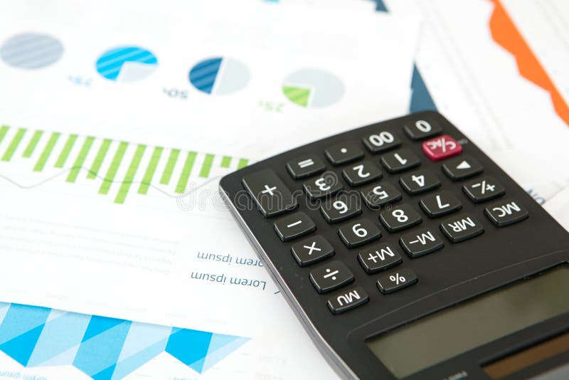 A Calculator on Business Chart Stock Image - Image of calculator ...