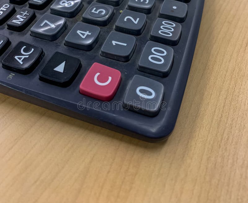 Calculator on a Table with White Numbers Stock Photo - Image of ...