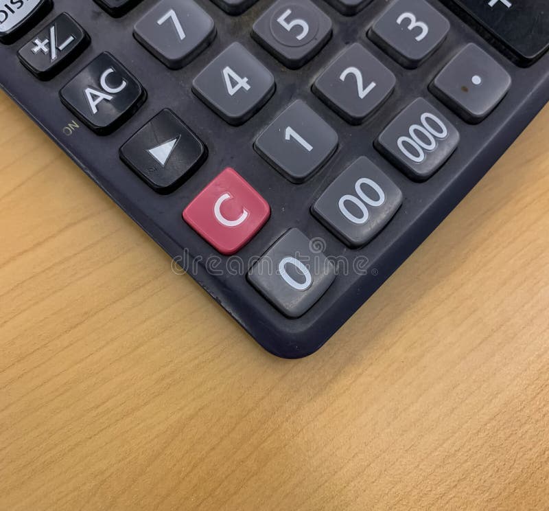 Calculator on the Table with Numbers in White Stock Photo - Image of ...