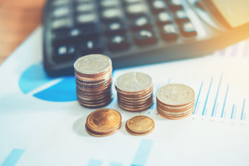 Calculator and Coin on the Business Paper. Report Chart Stock Photo ...