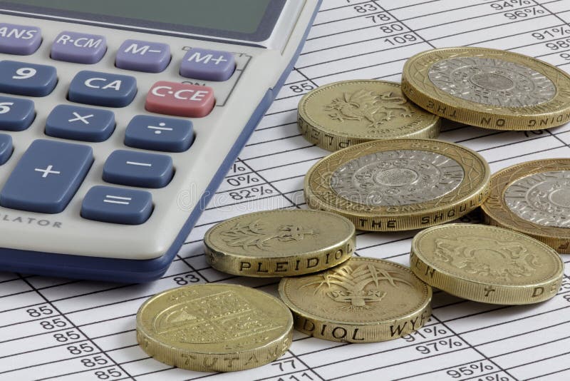 Calculator & Coins on a Spreadsheet Stock Photo - Image of account ...