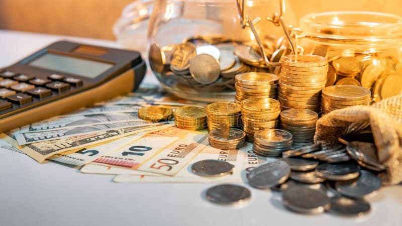 Calculator and International Currency on the Table Stock Photo - Image ...