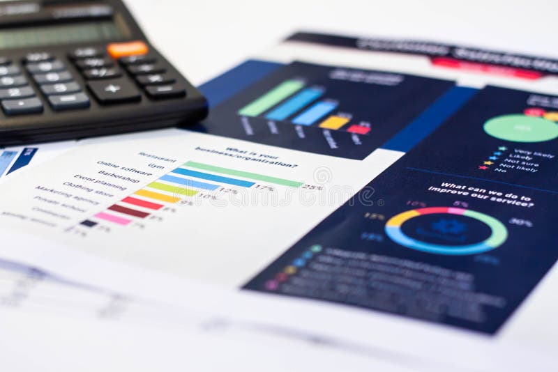 Calculator and Color Reports for Business. Printed Papers at Work Stock ...