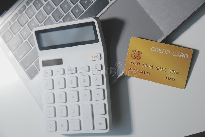 Calculator on a Dark Background, Plastic Cards and Banknotes Stock ...