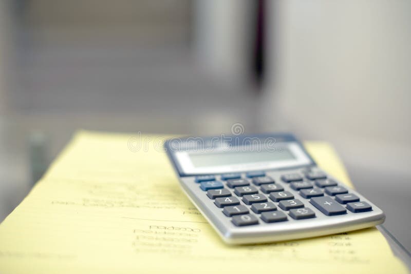 Calculator on Desk stock image. Image of financial, legalpad - 6796387