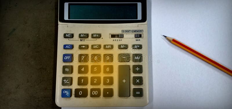 Calculator on the desk stock photo. Image of computer - 148831374