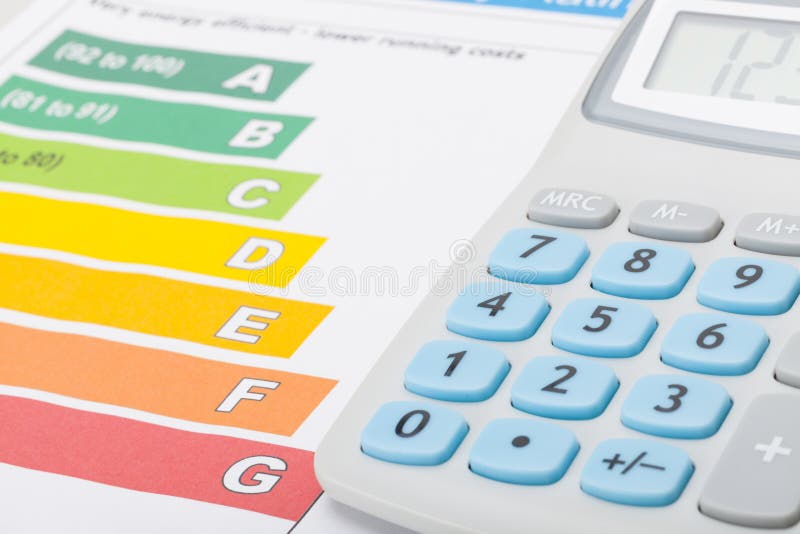 Calculator with Energy Efficiency Chart Stock Photo - Image of bill ...